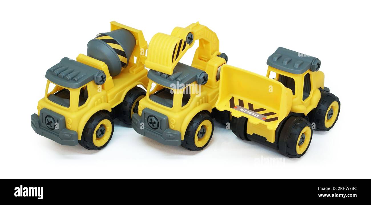 heavy construction toy line up in a row isolated on white background ...