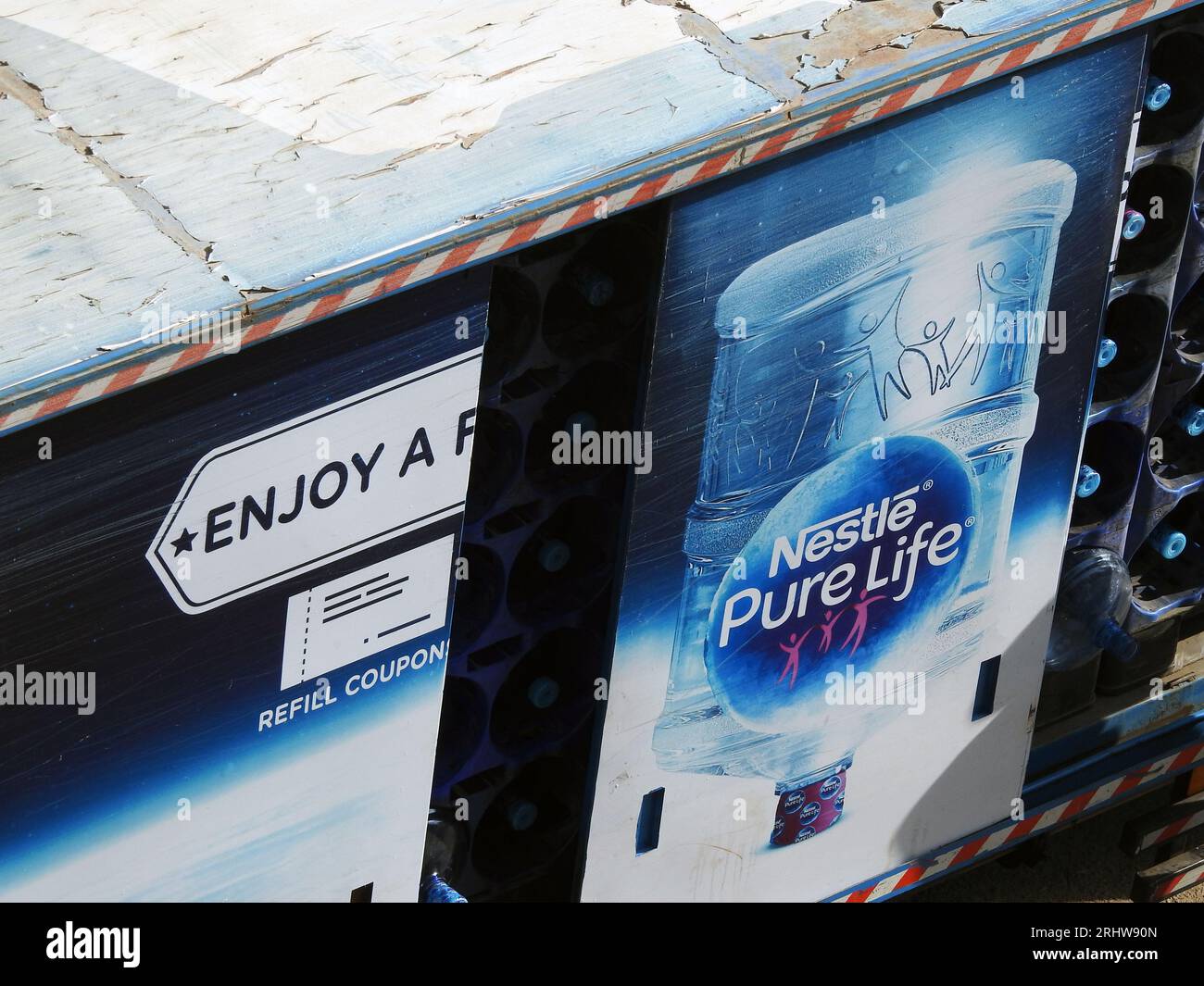 Cairo, Egypt, July 19 2023: Nestle pure Life plastic bottles delivery vehicle, Nestlé S.A., a ...
