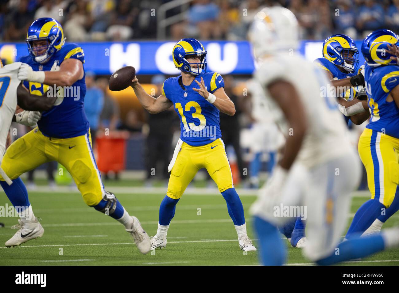 Los Angeles Rams quarterback Stetson Bennett (13) throws a pass during an NFL preseason football ...