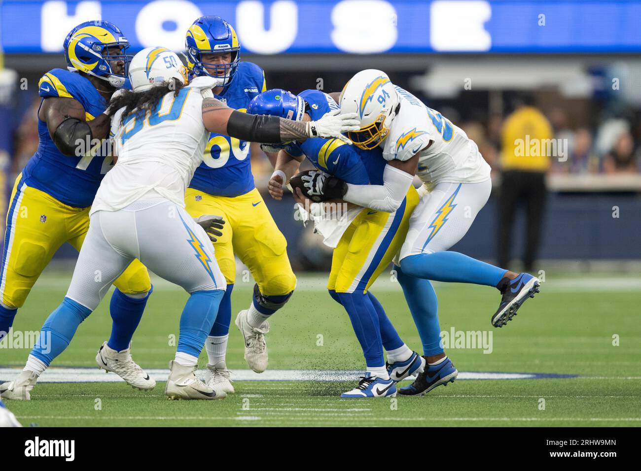 Los Angeles Chargers linebacker Chris Rumph II (94) tackles Los Angeles ...