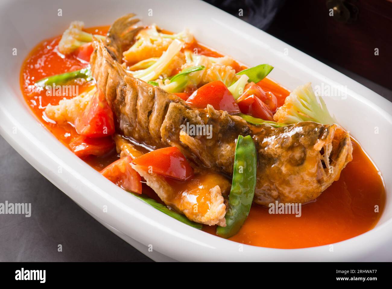 Chinese cuisine a braised yellow croaker Stock Photo - Alamy