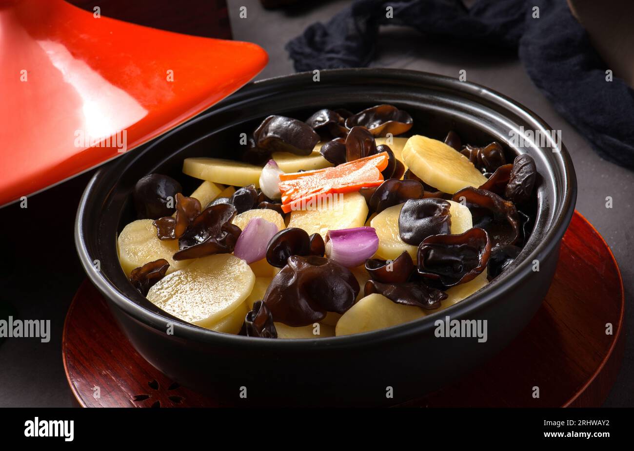 chinese food ,stir-fried black fungus and potato cooked in claypot ...