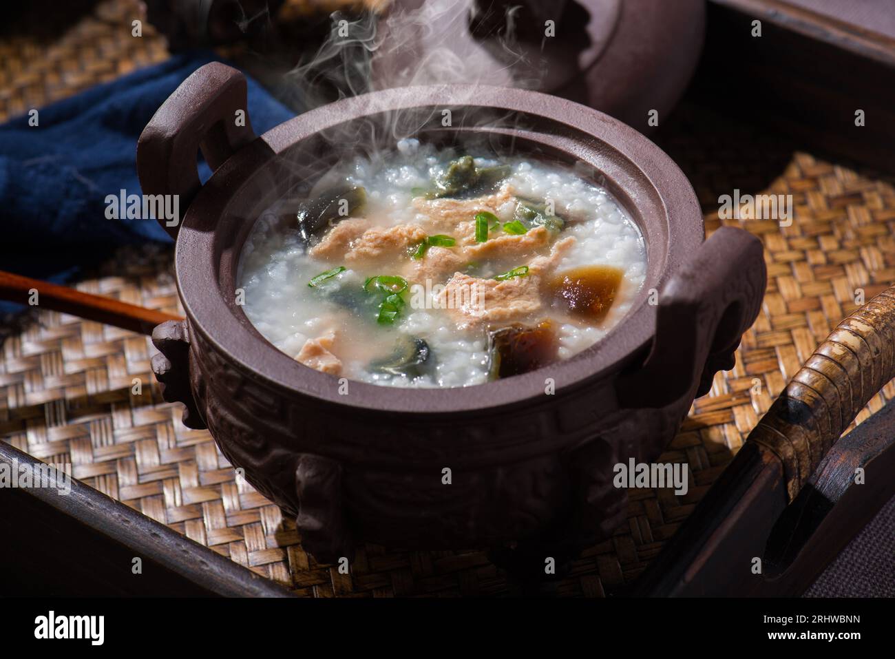 Congee with century egg. Chinese rice porridge served with century egg ...