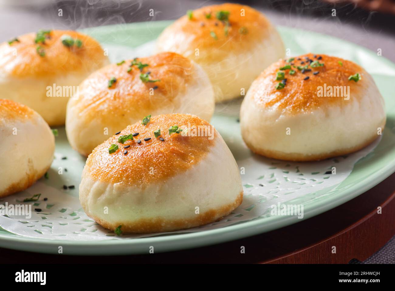 Pan-Fried Baozi Stuffed with Pork Stock Photo - Alamy