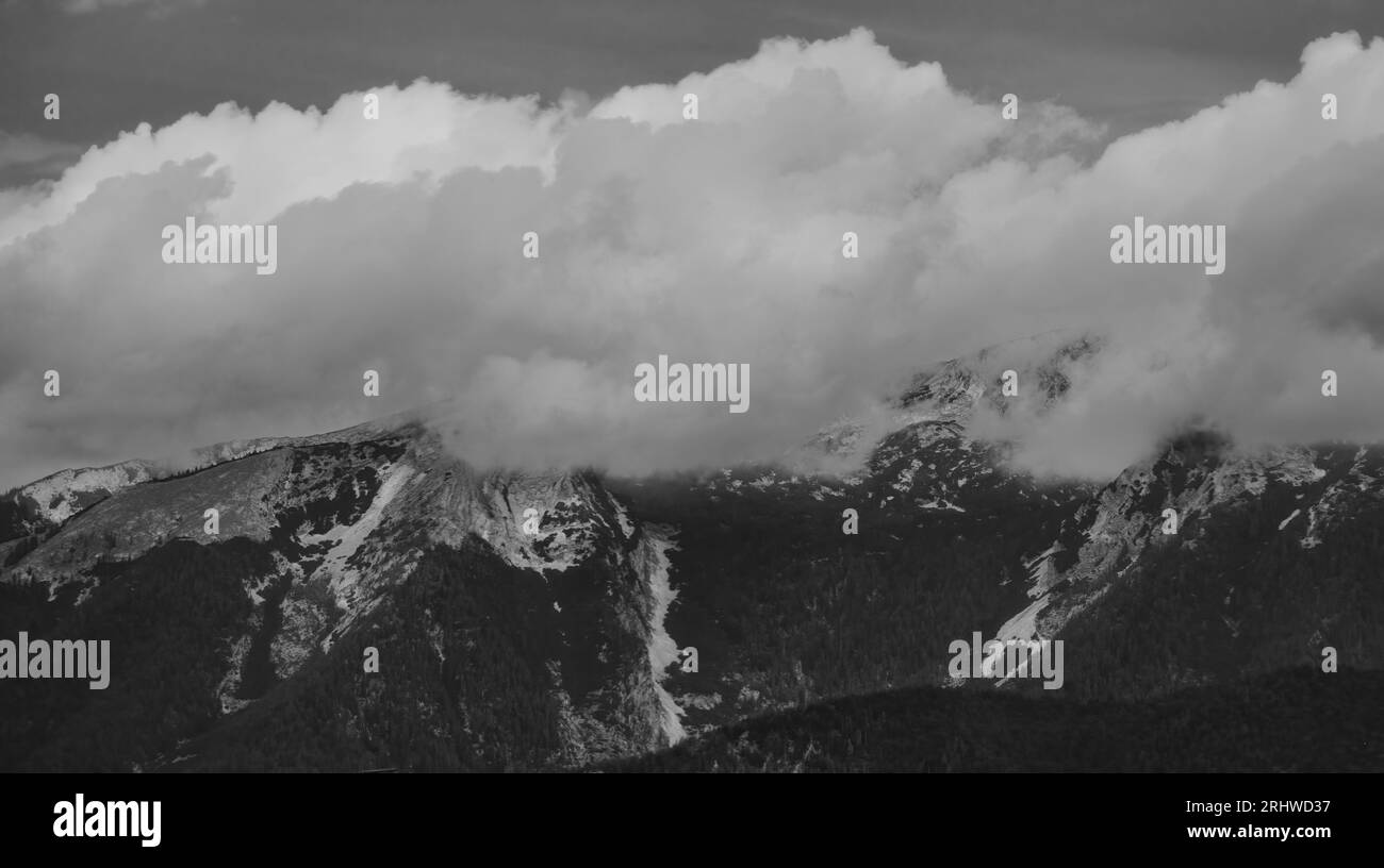 Alps mountains in stormy clouds, in black and white Stock Photo - Alamy