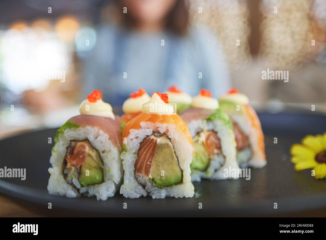Closeup, restaurant plate and sushi for lunch, eating seafood and ...