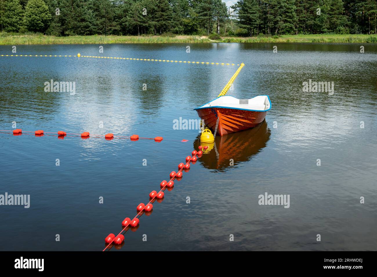 Empty lifeguard boat. Bathing area prepared for the reception of ...