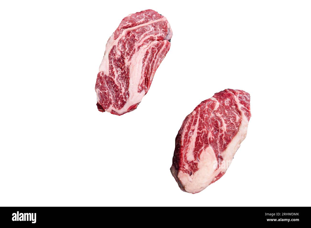 Raw chuck eye roll steaks, premium beef meat on a butcher board. High ...