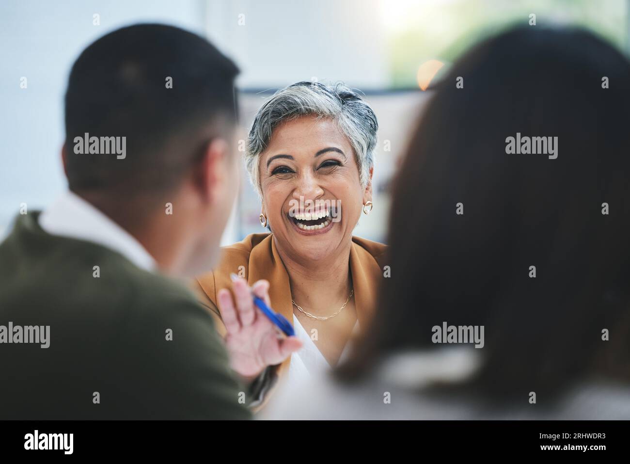 Team, happy woman or business people in meeting laughing at funny joke ...
