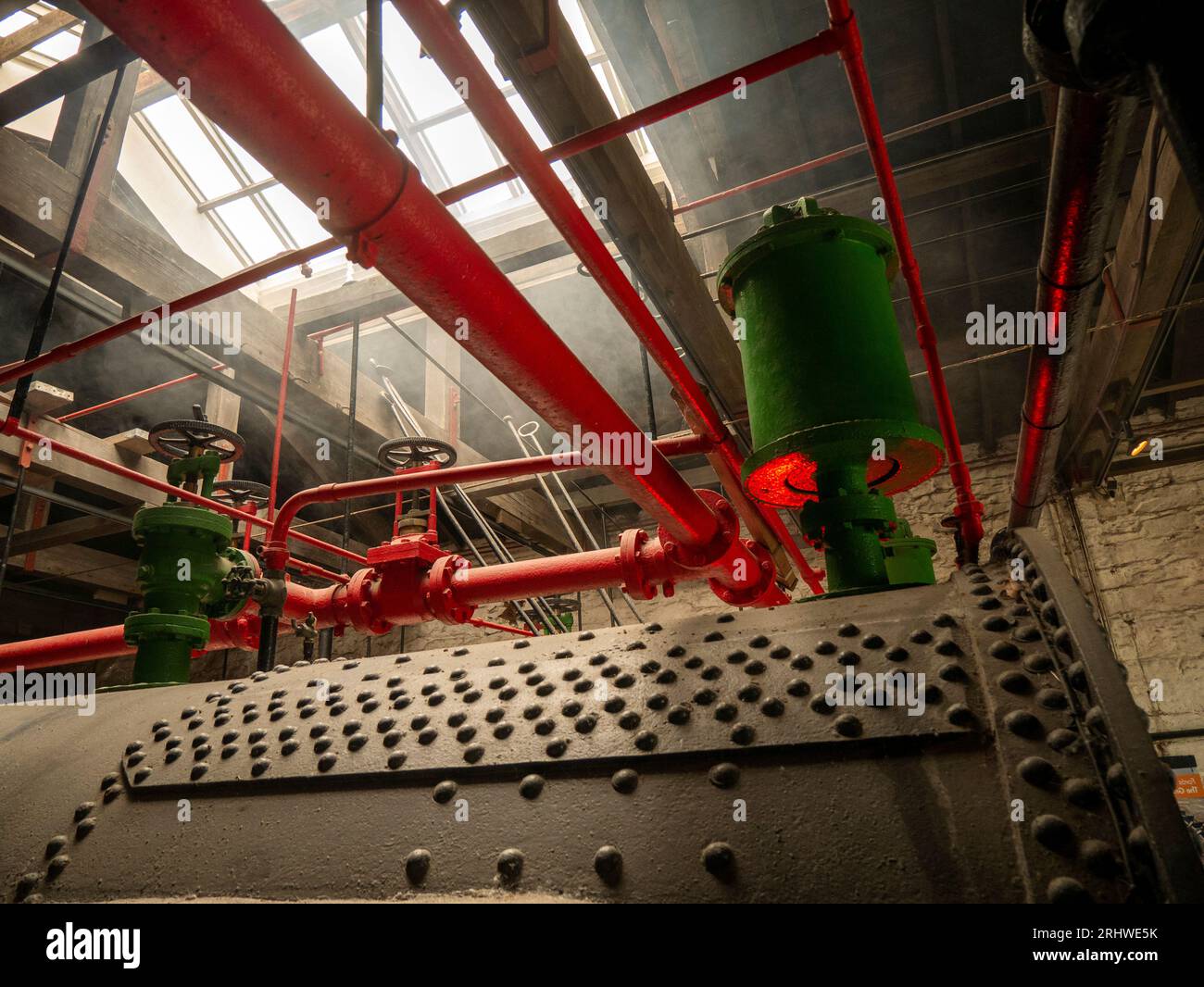 Industrial pipes background, power plant with steam engines and boilers ...