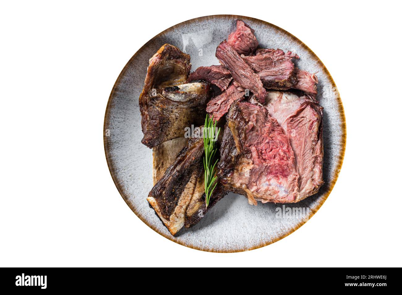 Roasted veal beef short ribs in plate with rosemary. High quality ...