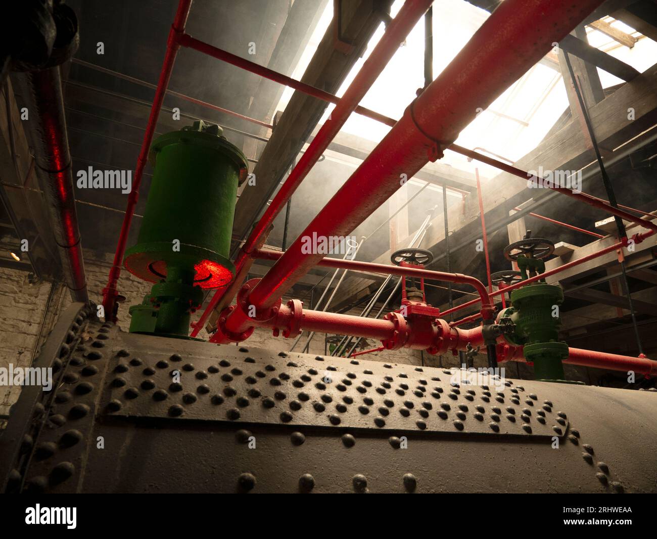 Industrial pipes at the power plant background, steam engines and ...