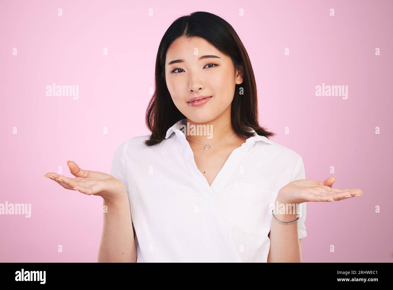 Doubt, decision and portrait of Asian woman on pink background for ...