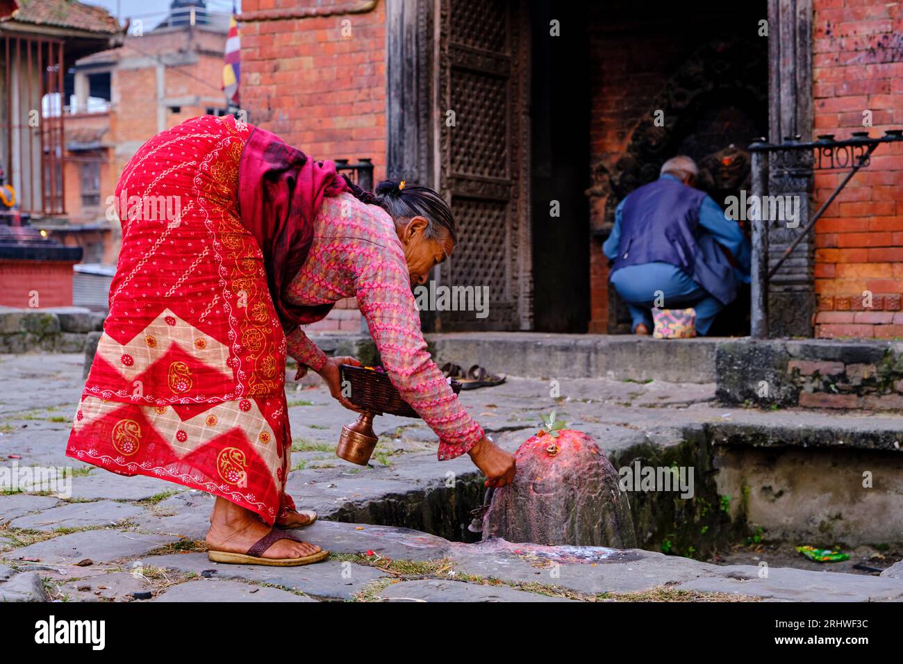 Nepal, Kathmandu valley, Bhaktapur city, morning offering Stock Photo ...