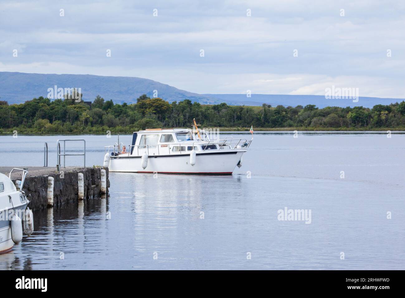 Boats and pleasure craft at Oughterard Pier on Lough Corrib, Galway ...
