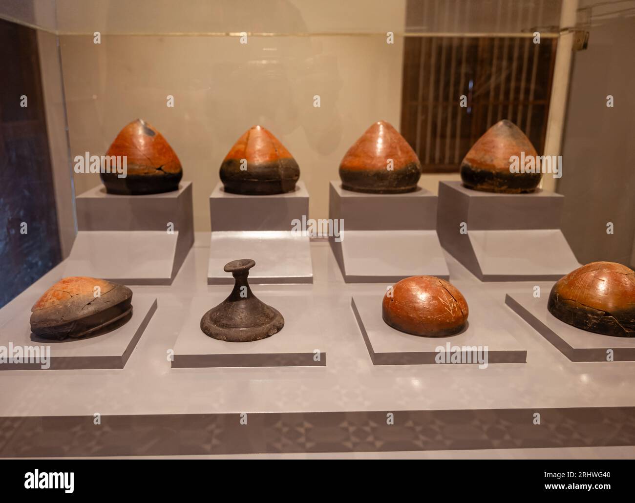 This stock image shows a collection of ancient pottery from the Keeladi ...