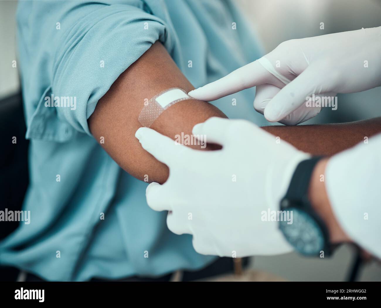 Plaster on arm, vaccine and wound, hands of doctor with patient and ...