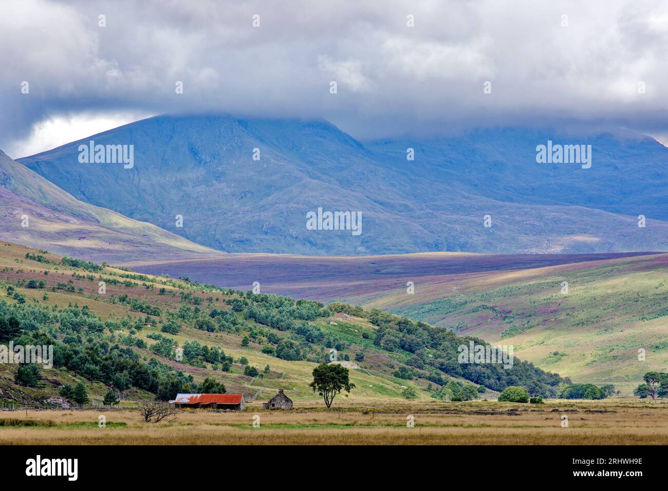 Ben More Assynt Sutherland Scotland heavy clouds over the mountain seen ...