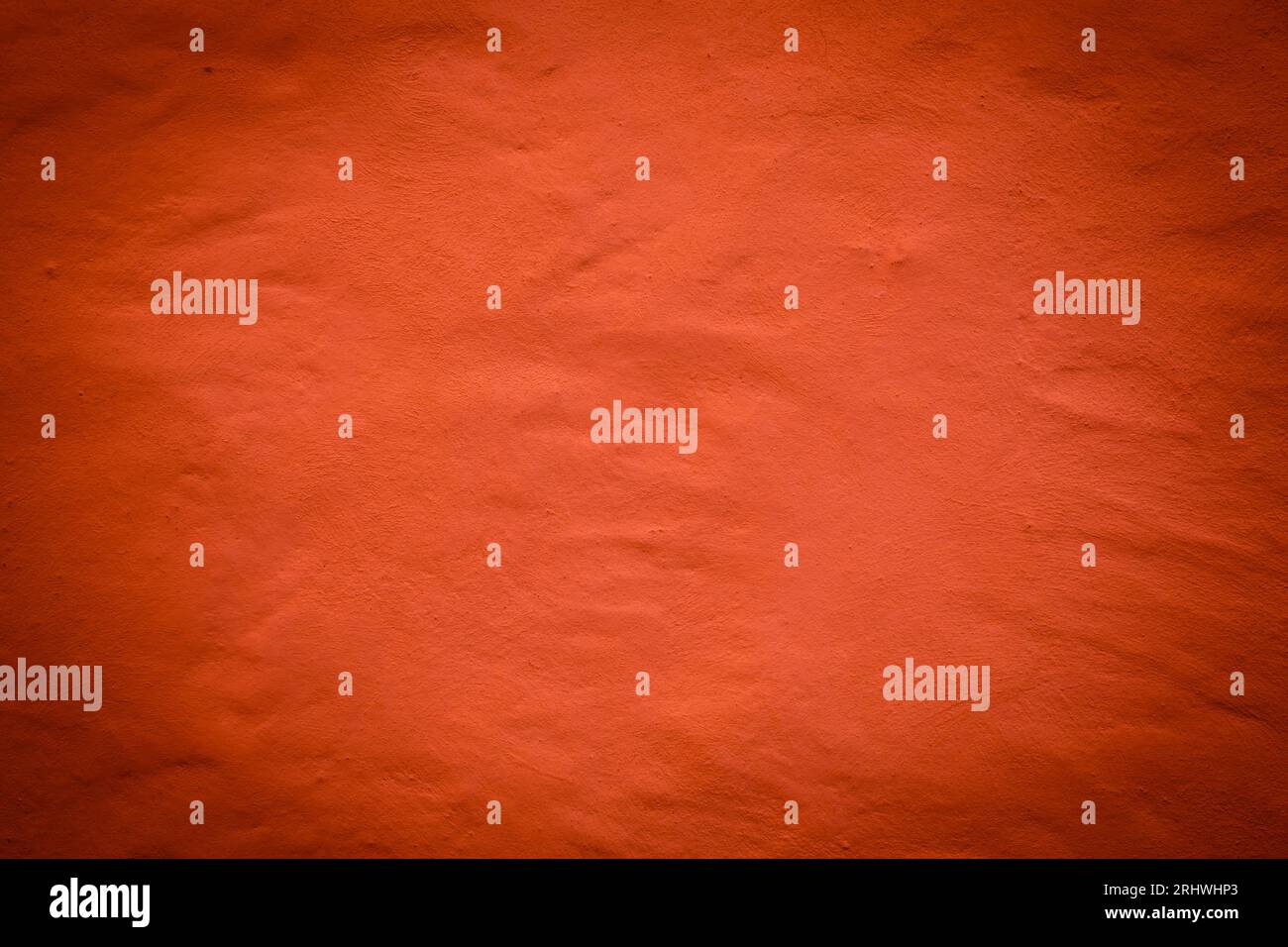 Red background wall texture with dark edges Stock Photo - Alamy