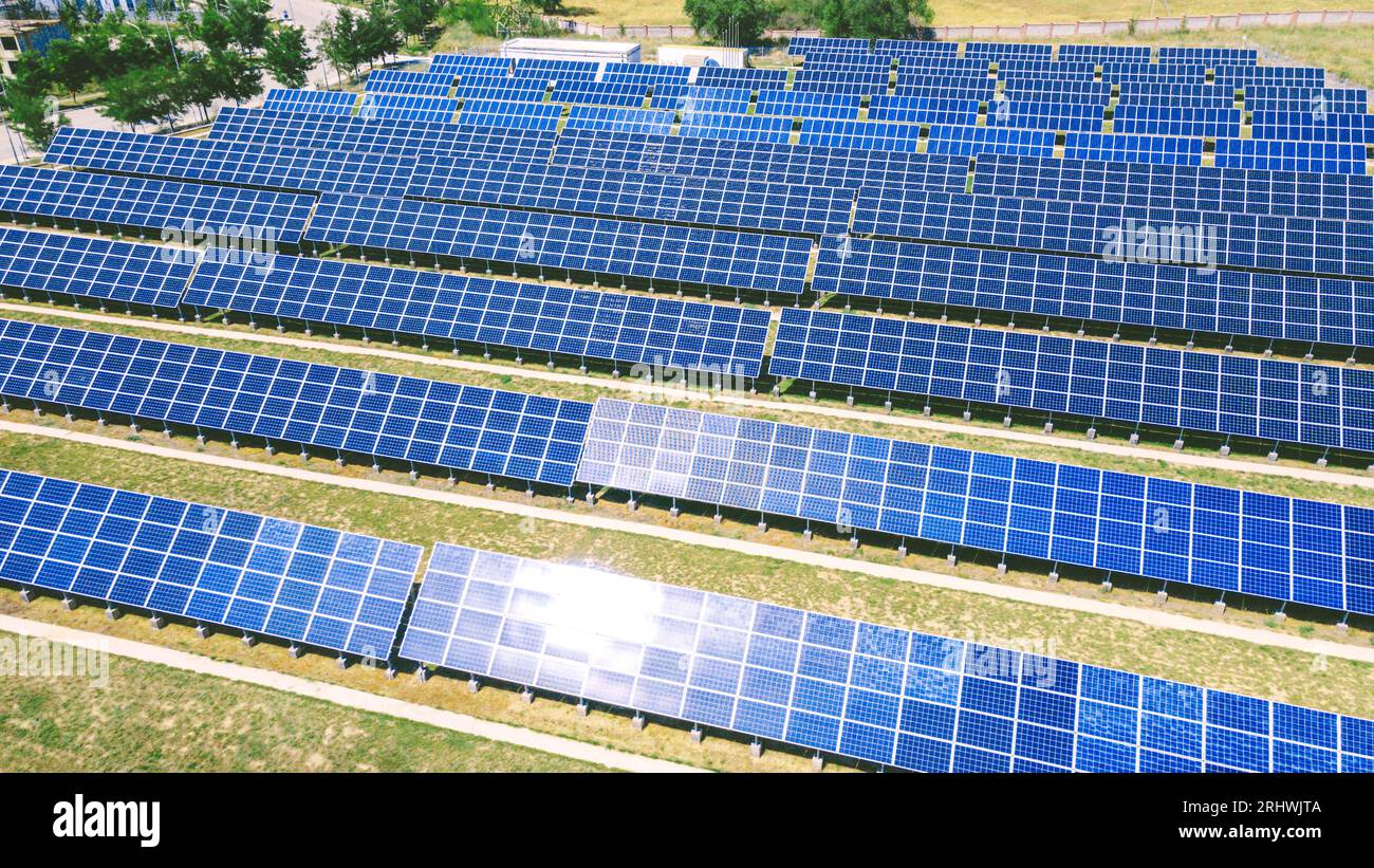 Large arrays of solar panels on a power plant. Renewable energy Stock ...