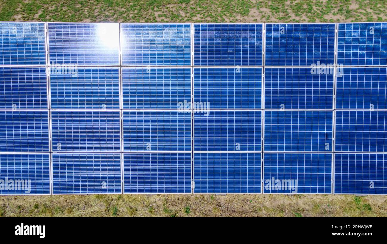 Solar panels installed on the surface of a field. Renewable energy ...