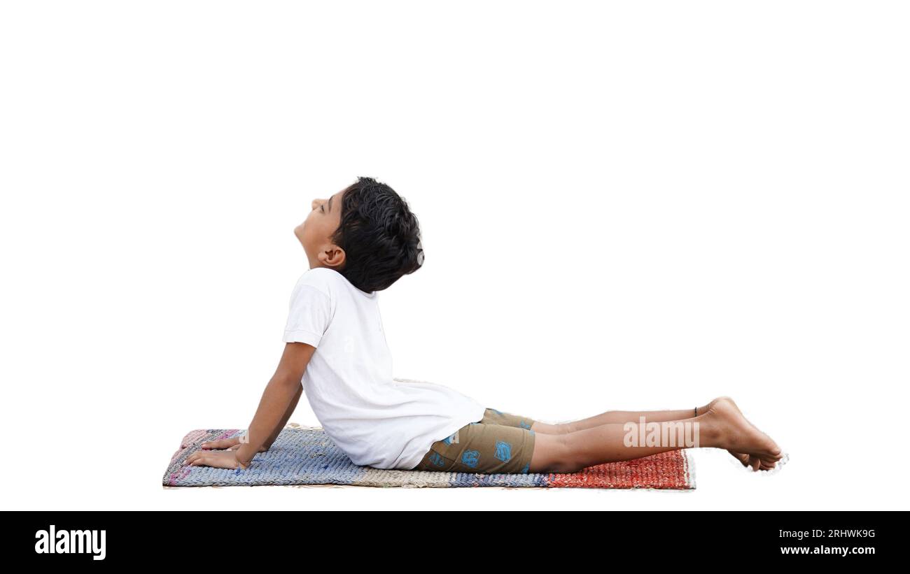 Little attractive boy exercising, Indian boy practicing meditation ...