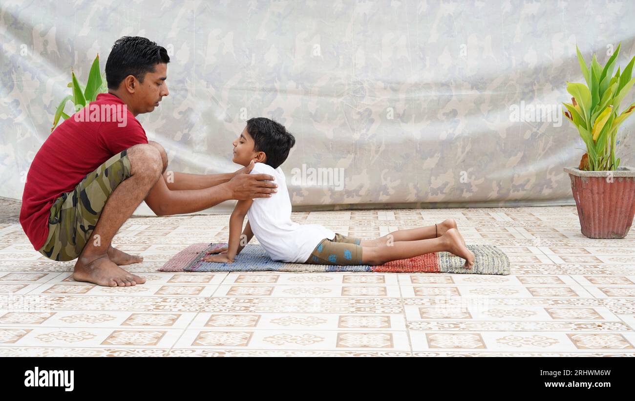 Asian Indian man fitness coach teach her student exercise in fitness ...