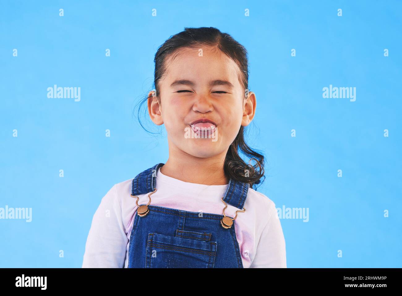 Funny, face of child and girl with silly, goofy or facial expression on ...