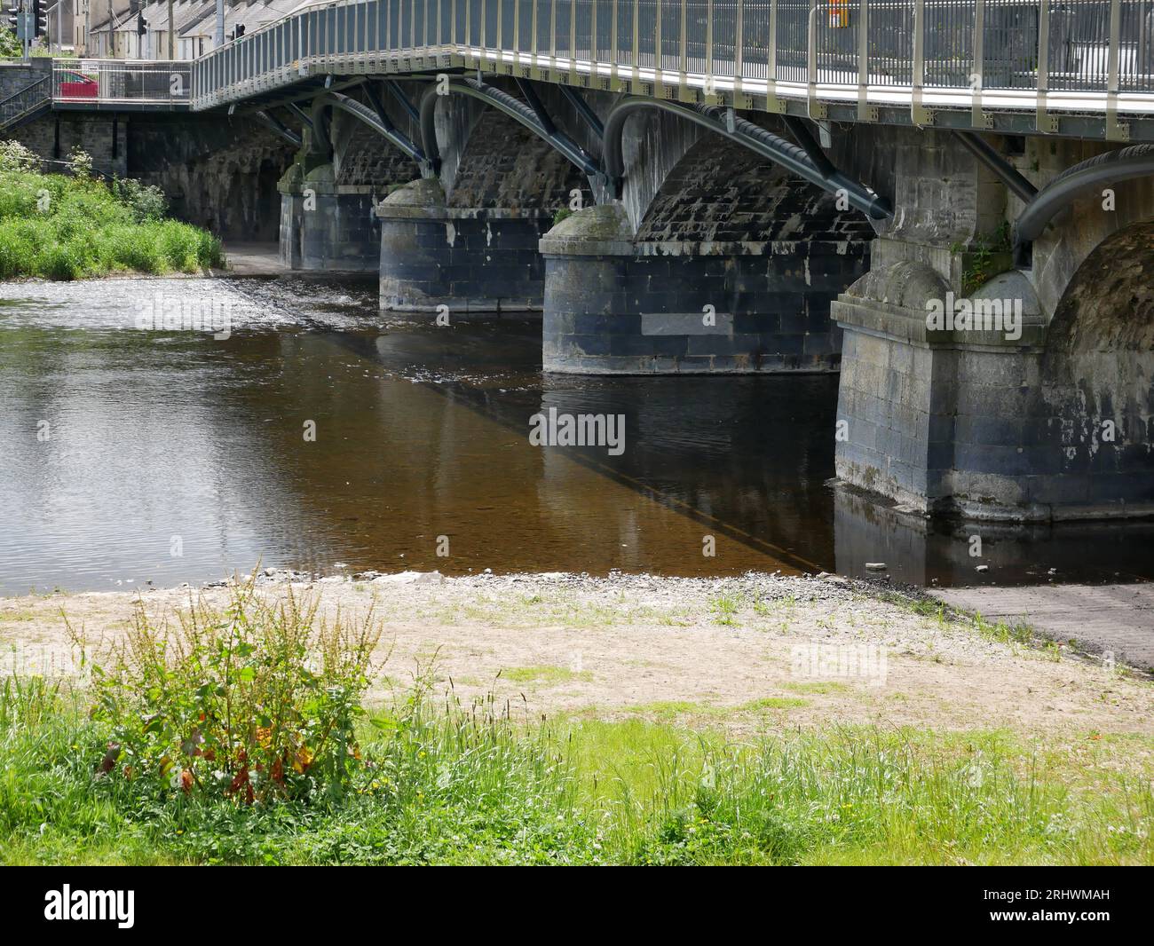 Old stone bridge in Ireland, ancient bridge made of stones and bricks ...