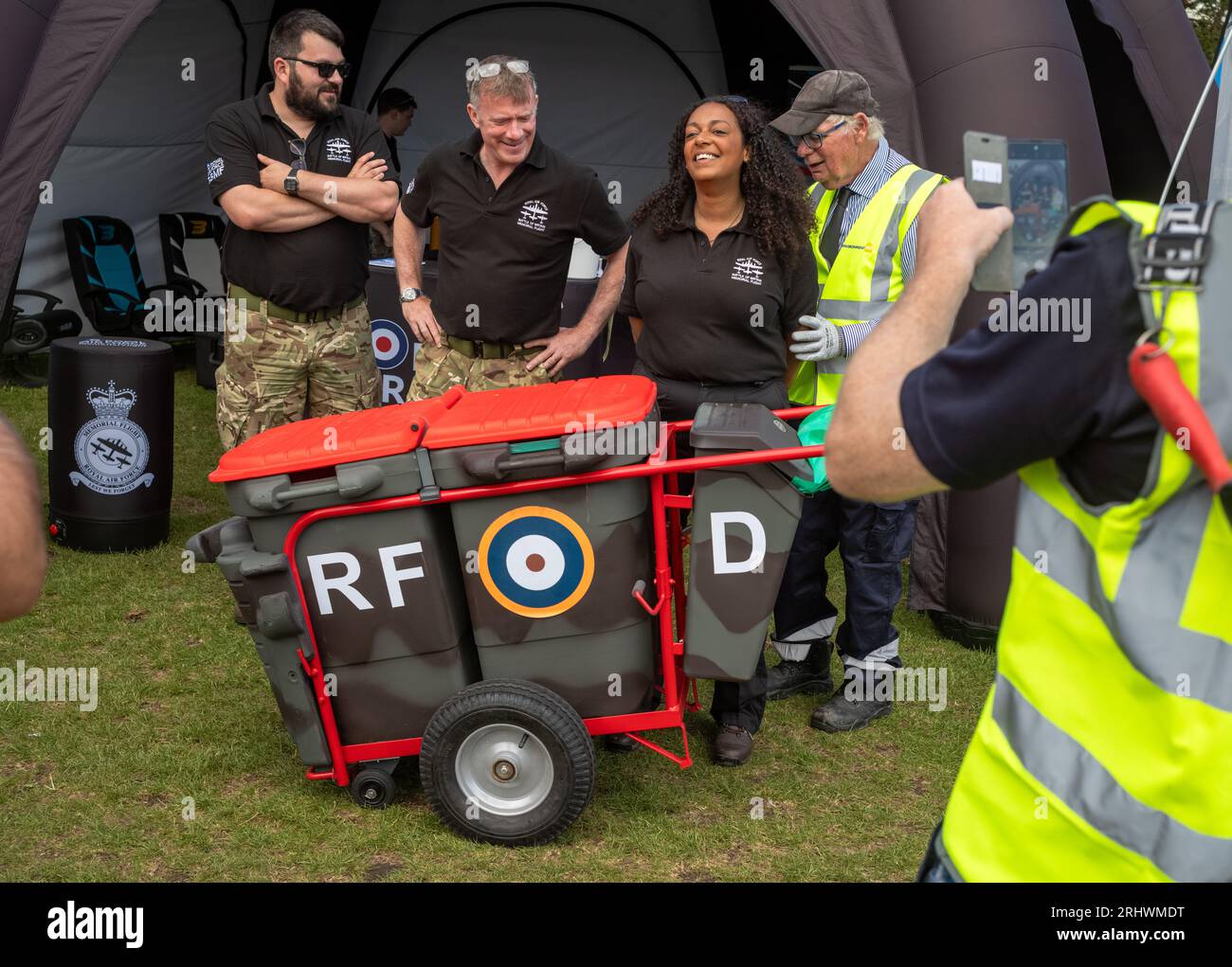 Eastbourne, UK. 19 Aug 2023. An elderly municipal bin man with his bins ...