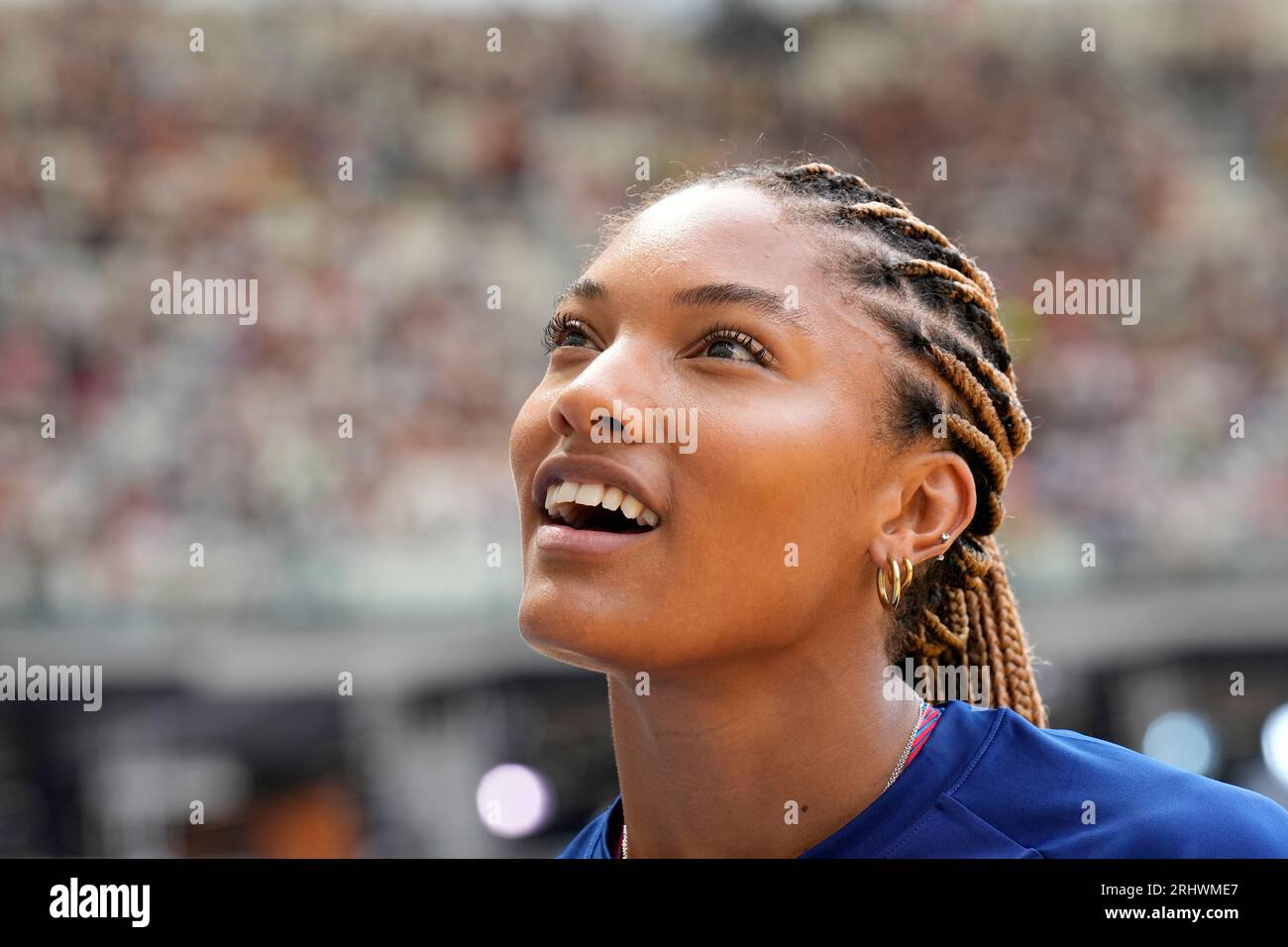 Tara Davis-Woodhall, of the United States, smiles as he attends in the ...