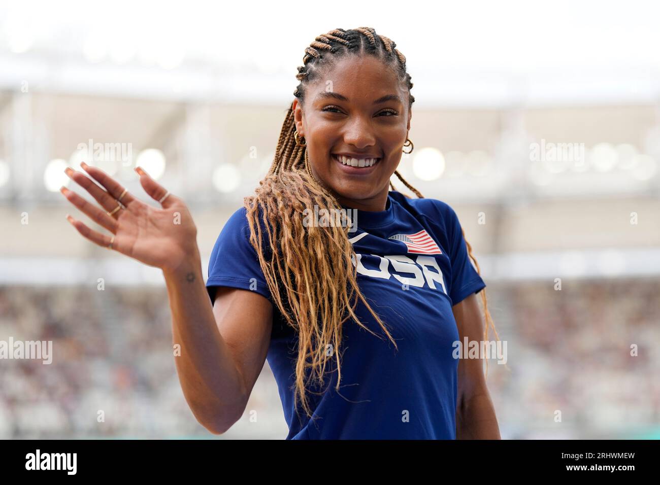 Tara Davis-Woodhall, of the United States, smiles as he attends in the ...