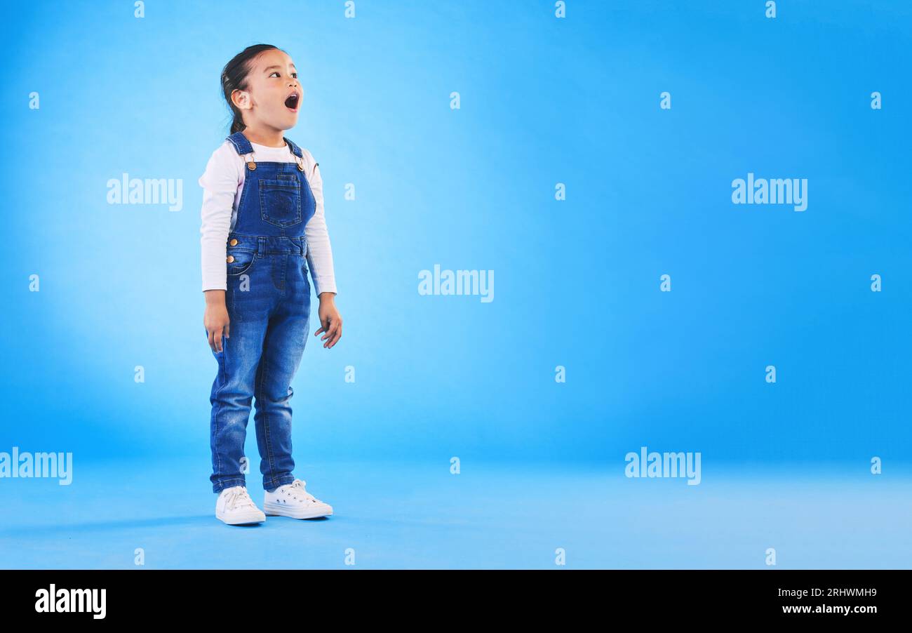 Shock, surprise and girl child in a studio with mockup space for ...