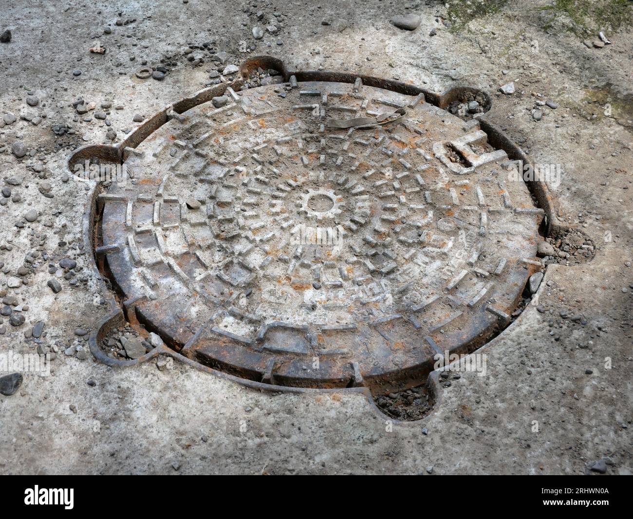 Manhole grunge style background, ground close view photo Stock Photo ...