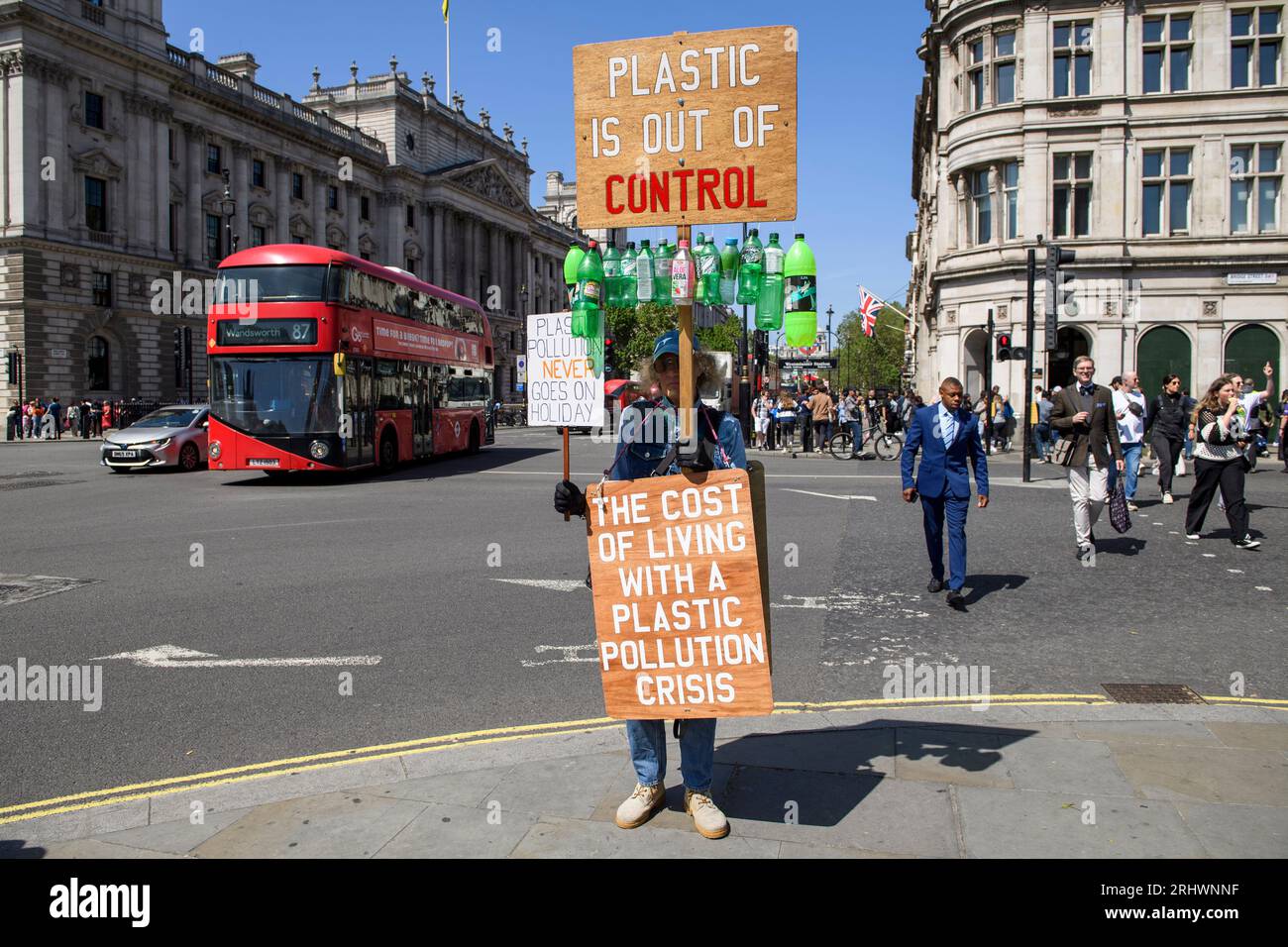 An environmental protester demonstrating against the use of plastic ...