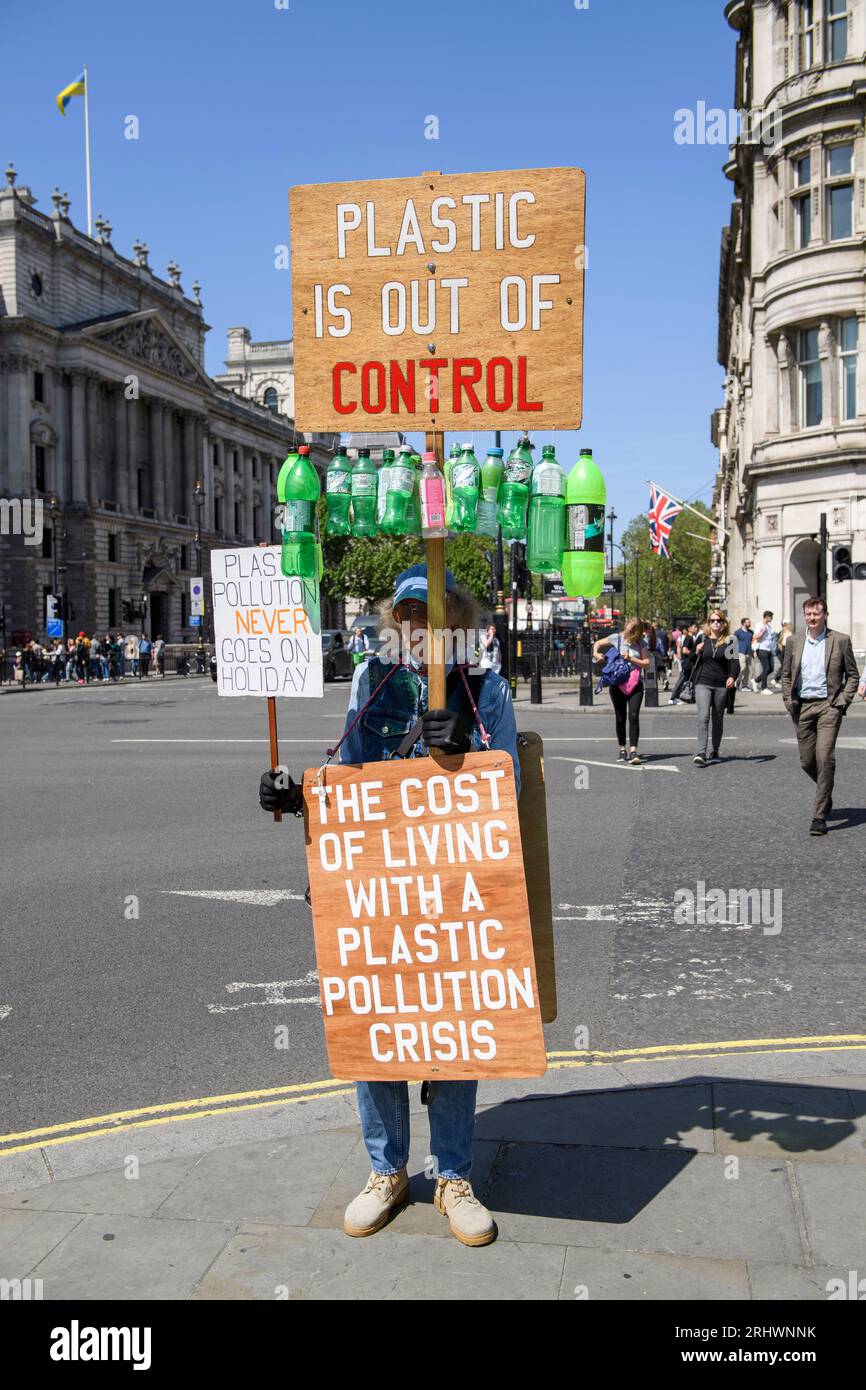 An environmental protester demonstrating against the use of plastic ...