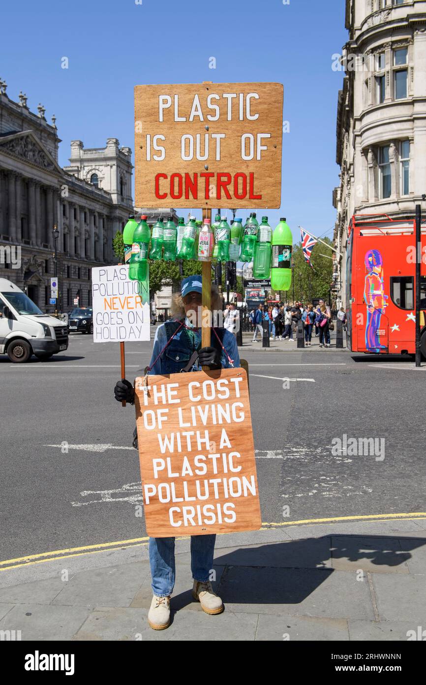 An environmental protester demonstrating against the use of plastic ...