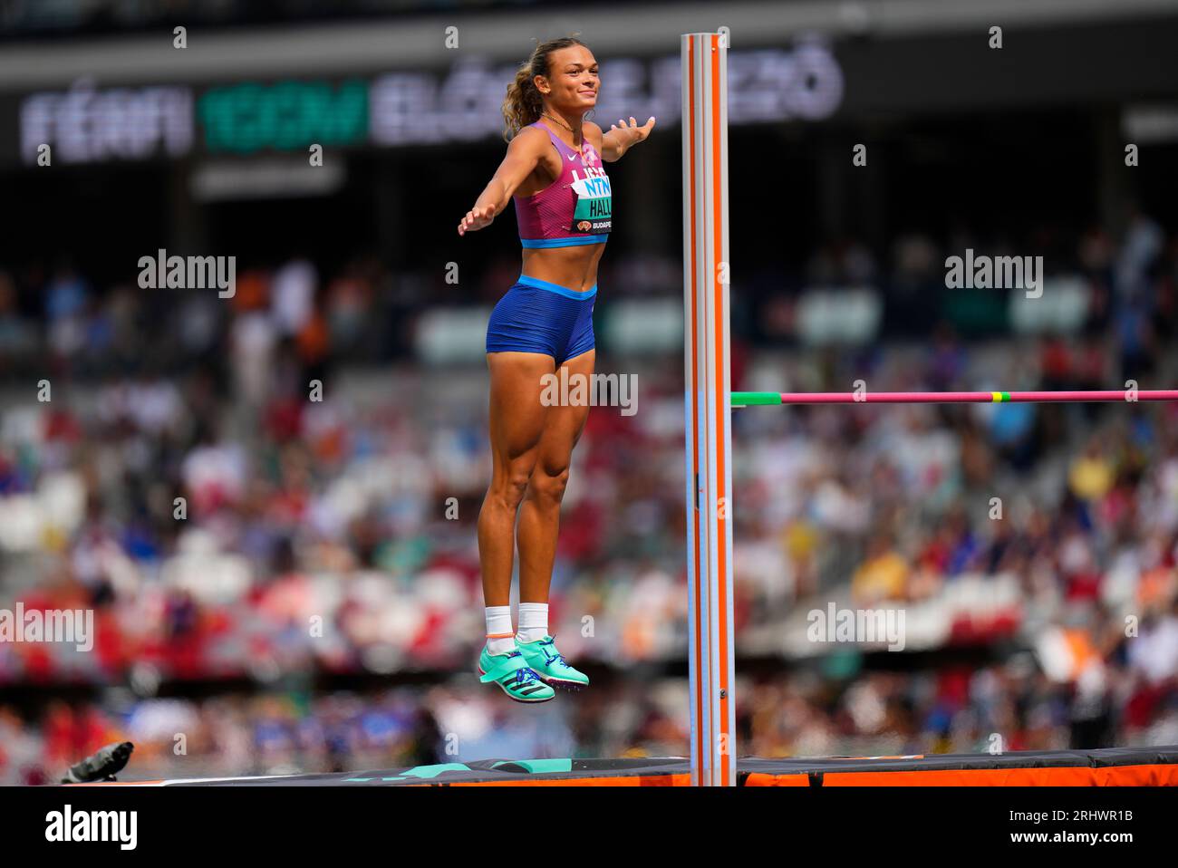 Anna Hall, of the United States reacts as she competes in the ...