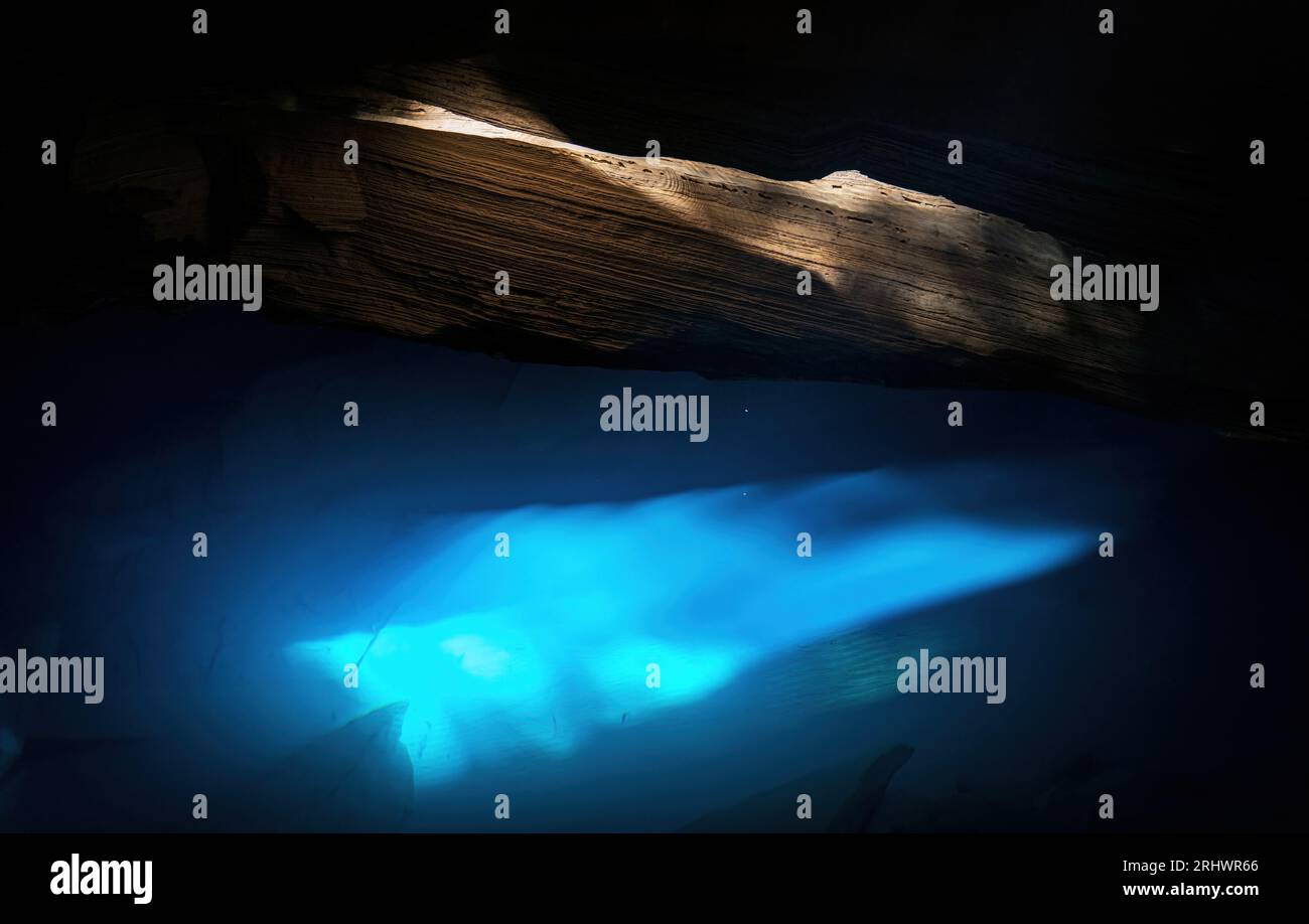 Astonishing Light Reflections in a Rugged Cave Interior Stock Photo - Alamy