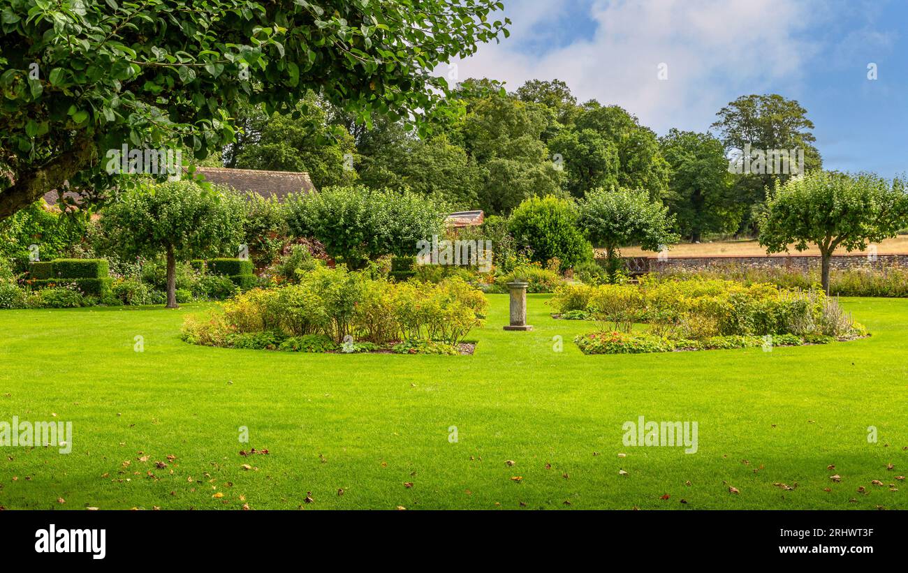 Extensive vibrant gardens at The Manor House in Baddesley Clinton ...