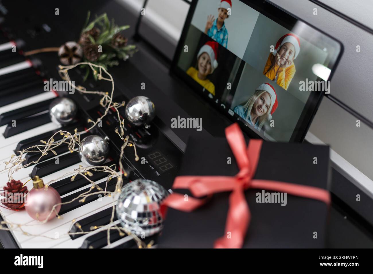 Christmas video call tablet. synthesizer, piano keys Stock Photo - Alamy