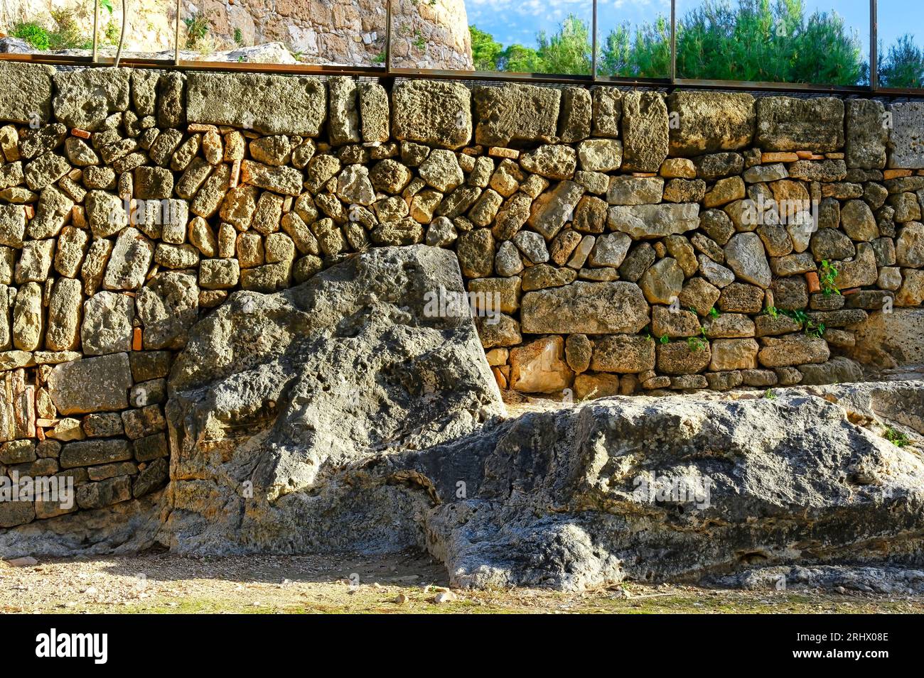 Denia, Alicante, Spain, stone wall using a natural rock as part of it ...