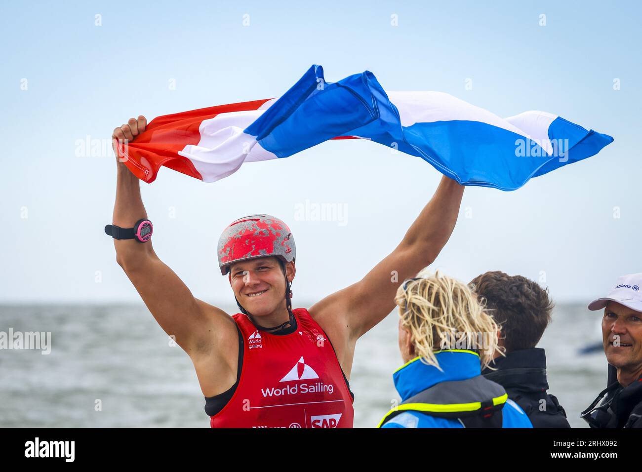 SCHEVENINGEN - Luuc van Opzeeland reacts after winning the iQfoiling ...