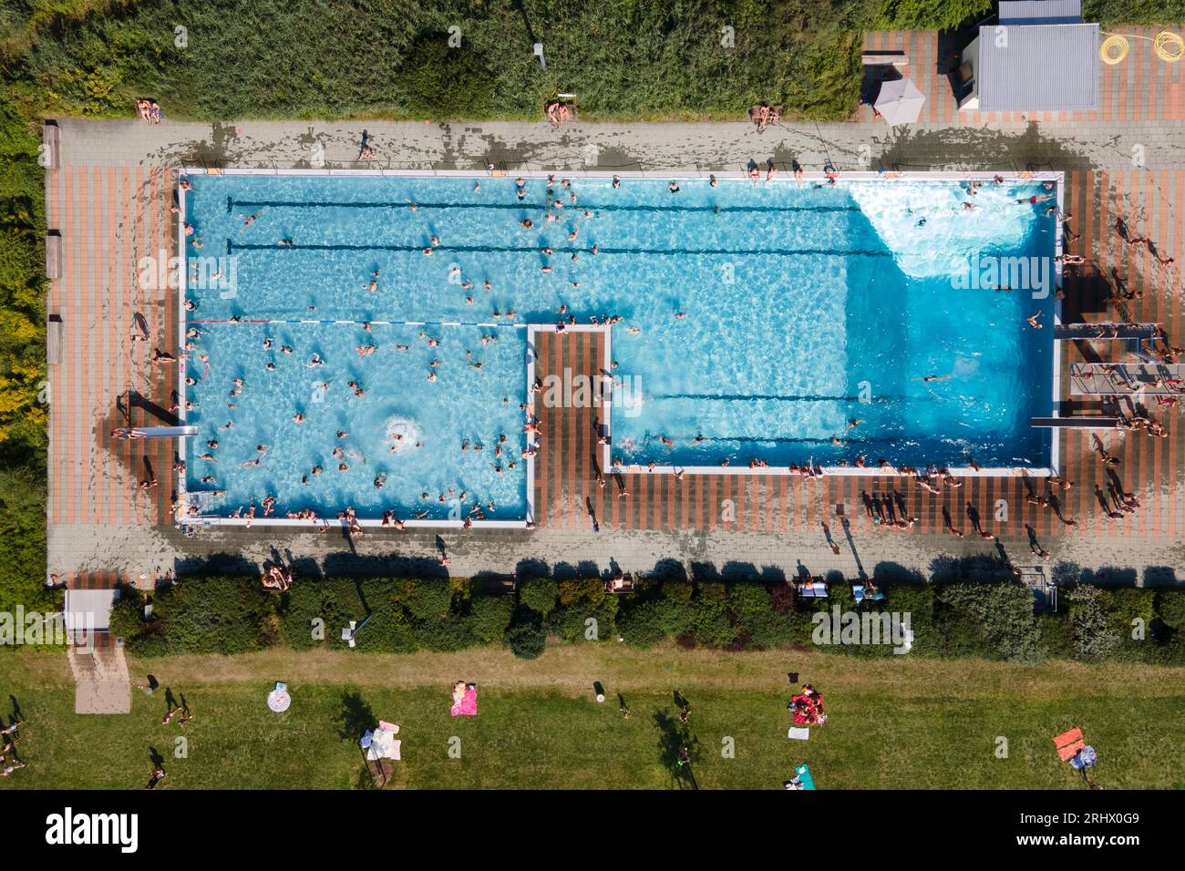 Dresden, Germany. 19th Aug, 2023. Bathers of the outdoor swimming pool ...