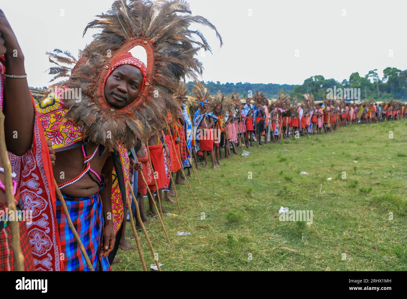 Maasai participants with traditional regalia walk during a Eunoto ...