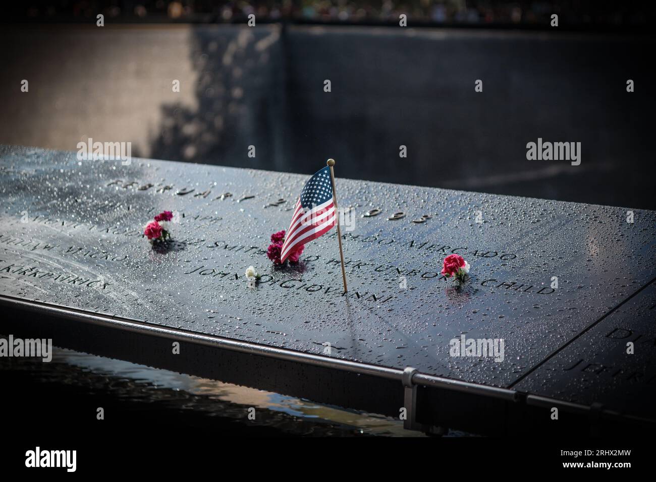 National September 11 Memorial, american flag, flowers, names, New York ...