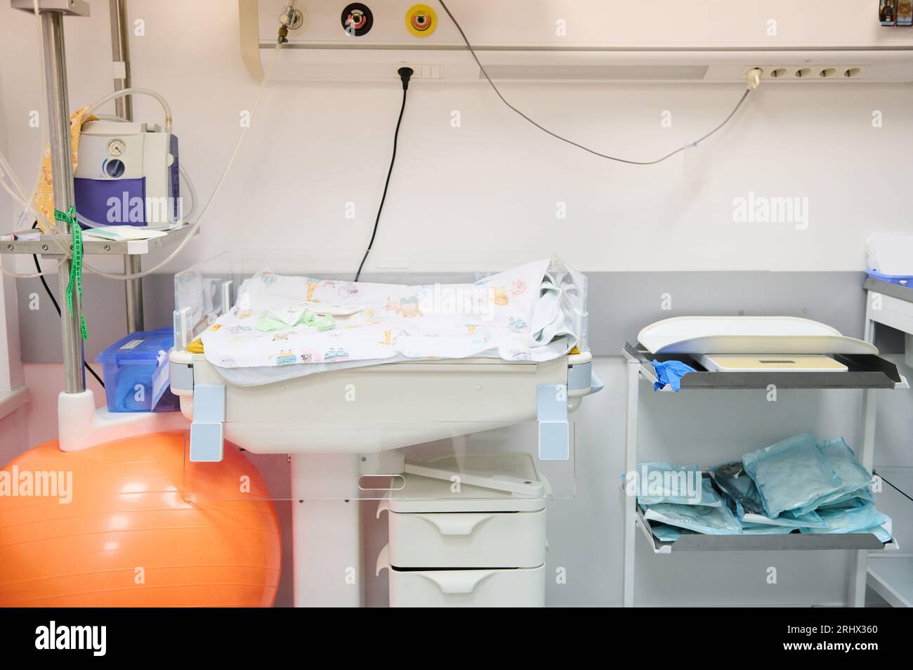 Neonatal incubator and weights for newborn, part of medical equipment ...