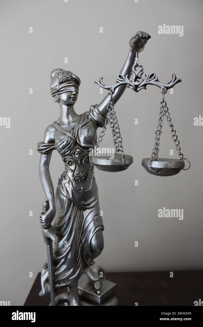 Statue of a woman symbolizing justice and law. justice and scales Stock ...