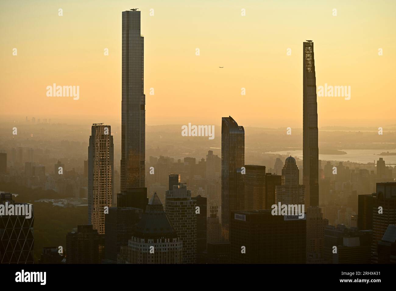 Photo by: NDZ/STAR MAX/IPx 2023 8/19/23 The sun rises behind buildings along Billionaires' Row ...