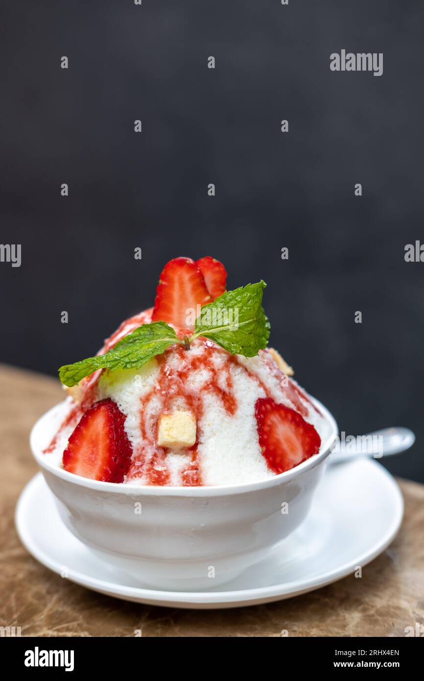 Shaved ice with strawberry and cheesecake Stock Photo - Alamy